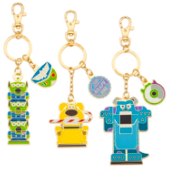 Disney | Accessories | Pixar Holiday Keychain Set Three Keychains ...